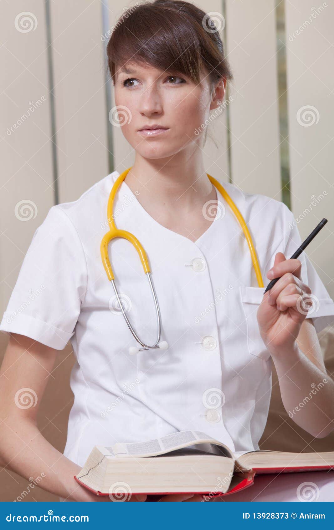 Female doctor with book stock image. Image of stethoscope - 13928373
