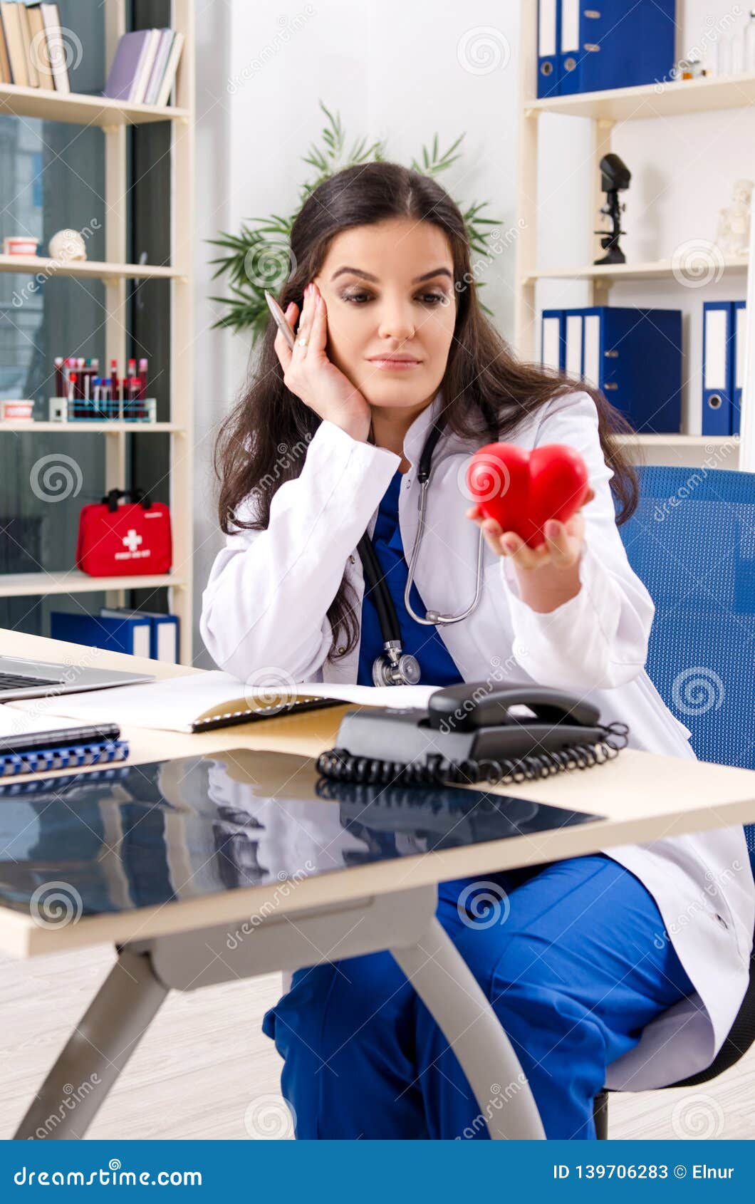 The Female Doctor Cardiologist Working in the Clinic Stock Image ...