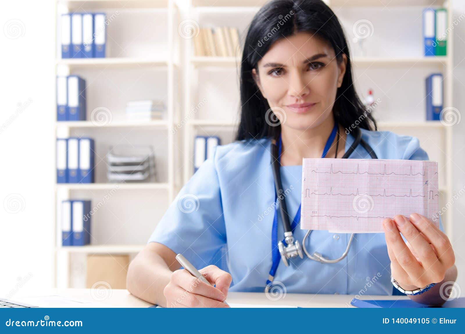 The Female Doctor Cardiologist Working in the Clinic Stock Image ...