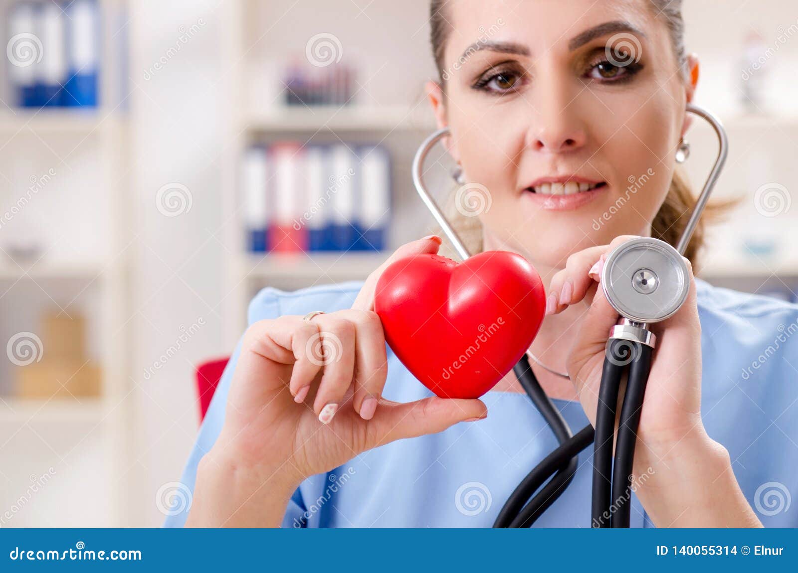 The Female Doctor Cardiologist Working in the Clinic Stock Photo ...