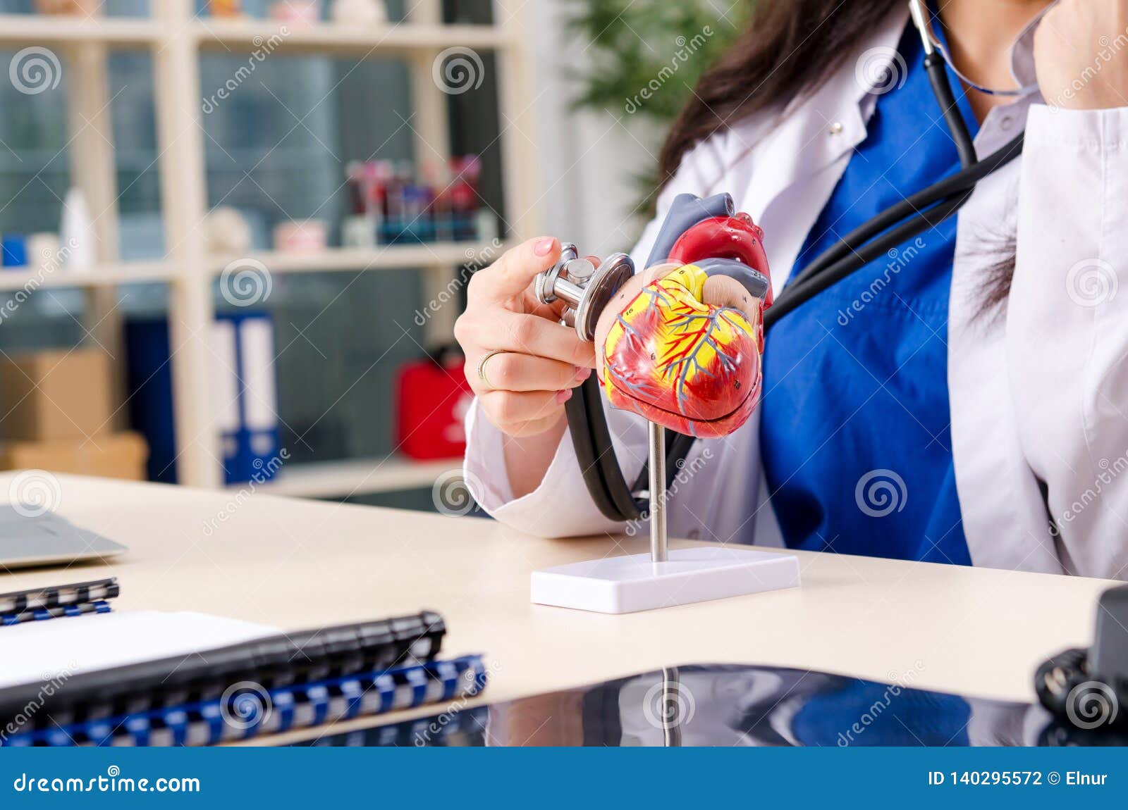 The Female Doctor Cardiologist Working in the Clinic Stock Photo ...