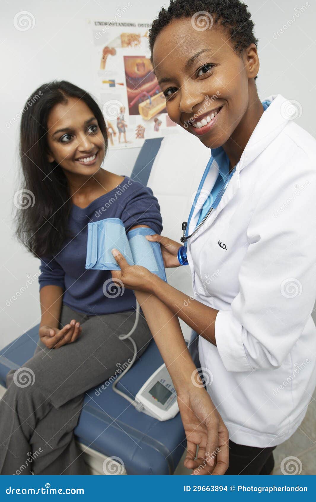 Female Doctor Checking Blood Pressure Stock Photo - Image of measuring ...