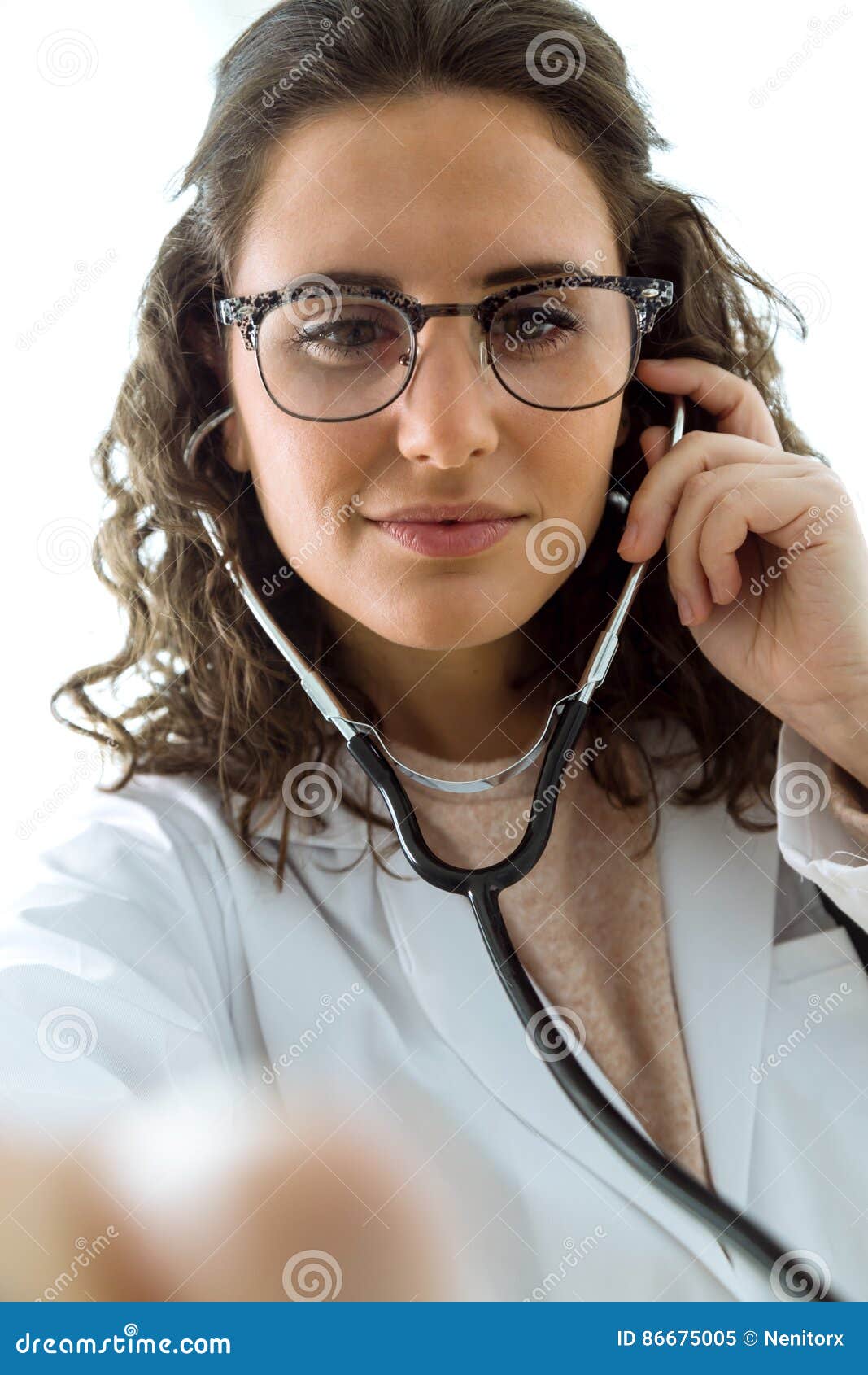 Female Doctor Checking Patient Heartbeat Using Stethoscope. Stock Image ...