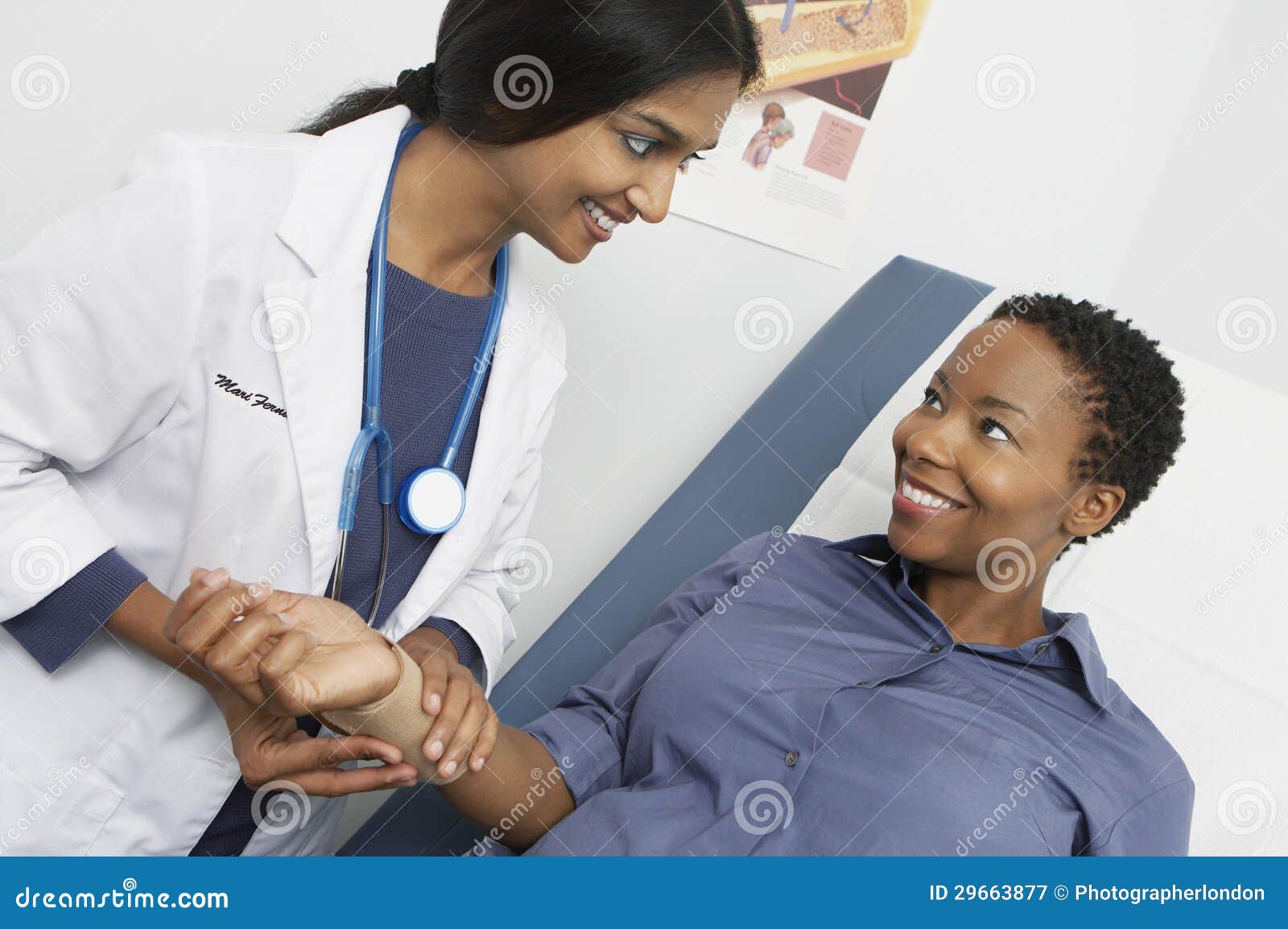 Female Doctor Checking Patient S Pulse Stock Image - Image of ...