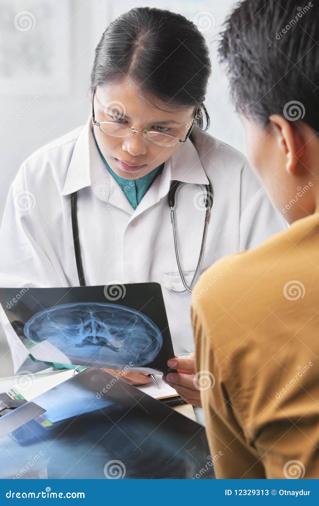Female Doctor Checking Patient Xray Stock Image - Image of roentgen ...