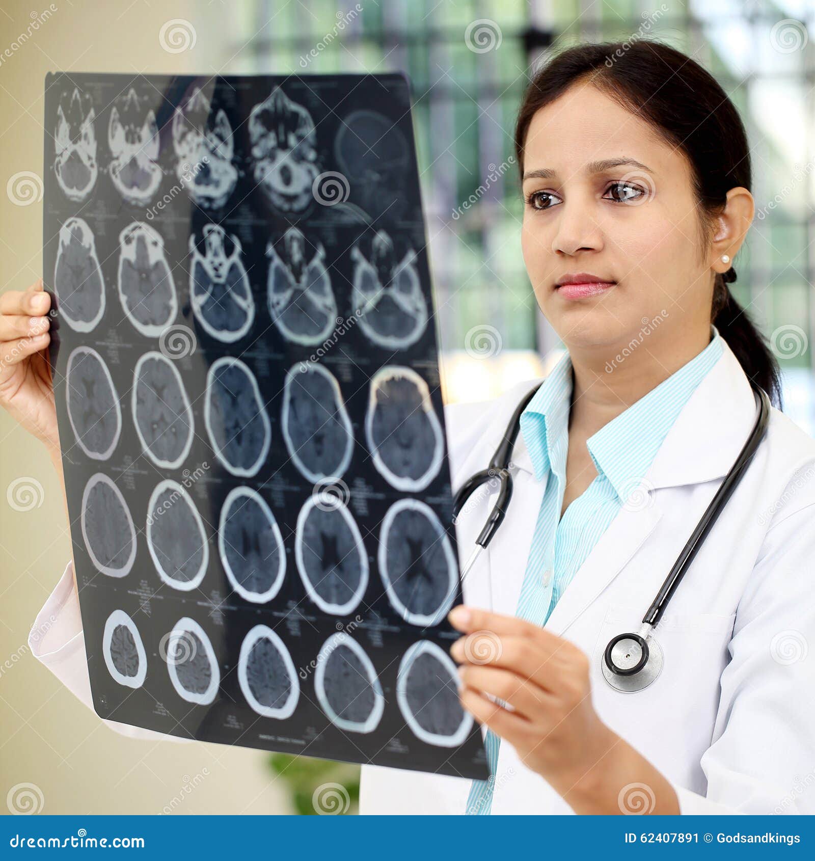 Female Doctor Examining a Brain Tomography Scan Stock Image - Image of ...