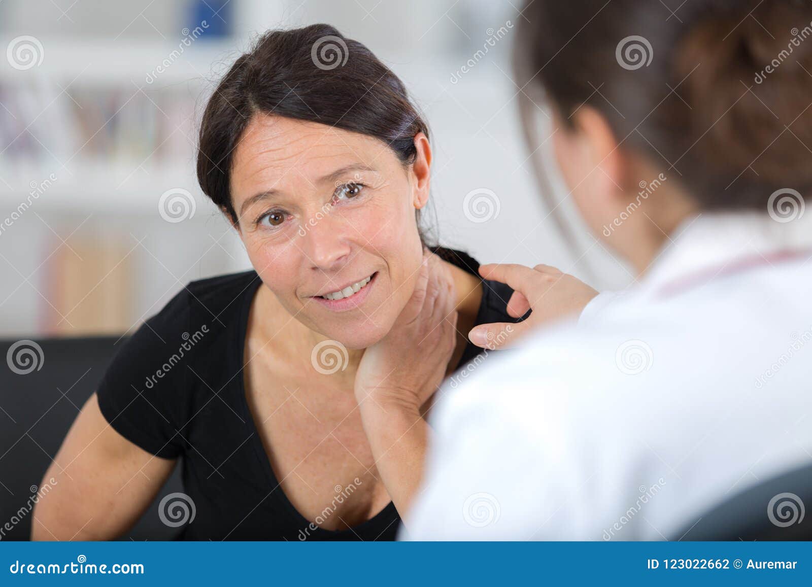 Female Doctor Explaining To Female Patient Stock Photo - Image of ...
