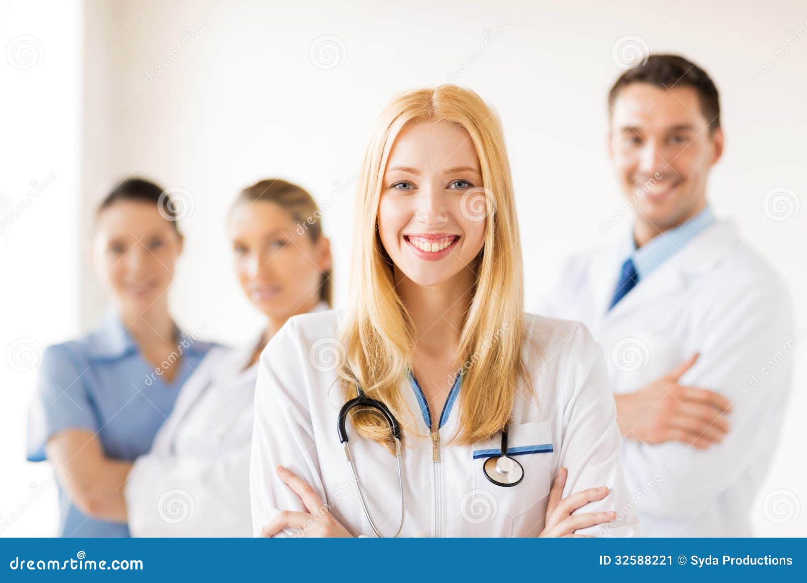 Female Doctor in Front of Medical Group Stock Image - Image of people ...