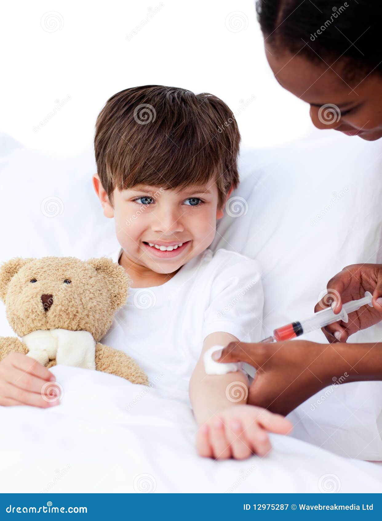 A Female Doctor Giving a Child an Injection Stock Image - Image of ...