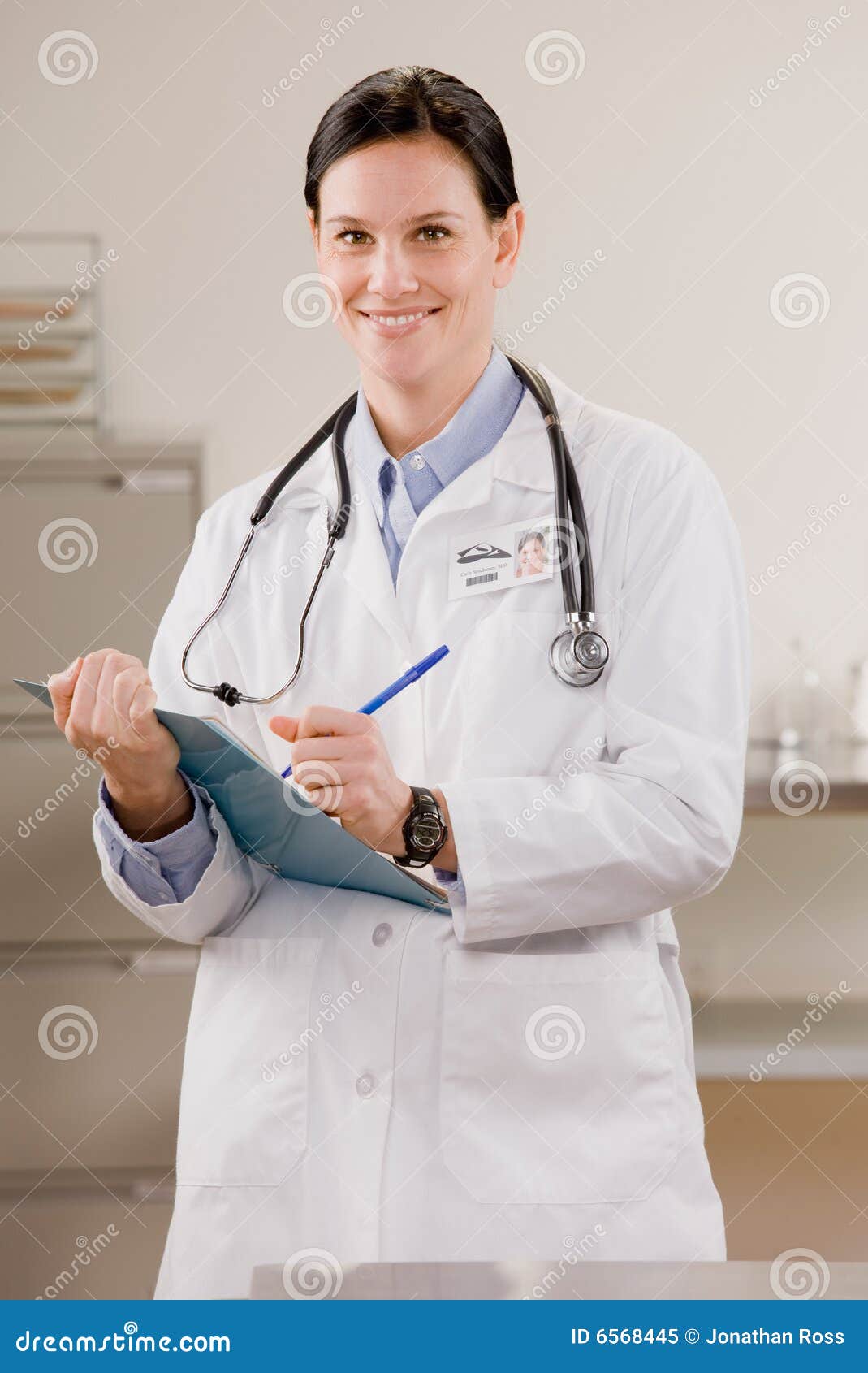 Female Doctor Holding Medical Chart Stock Image - Image of western ...
