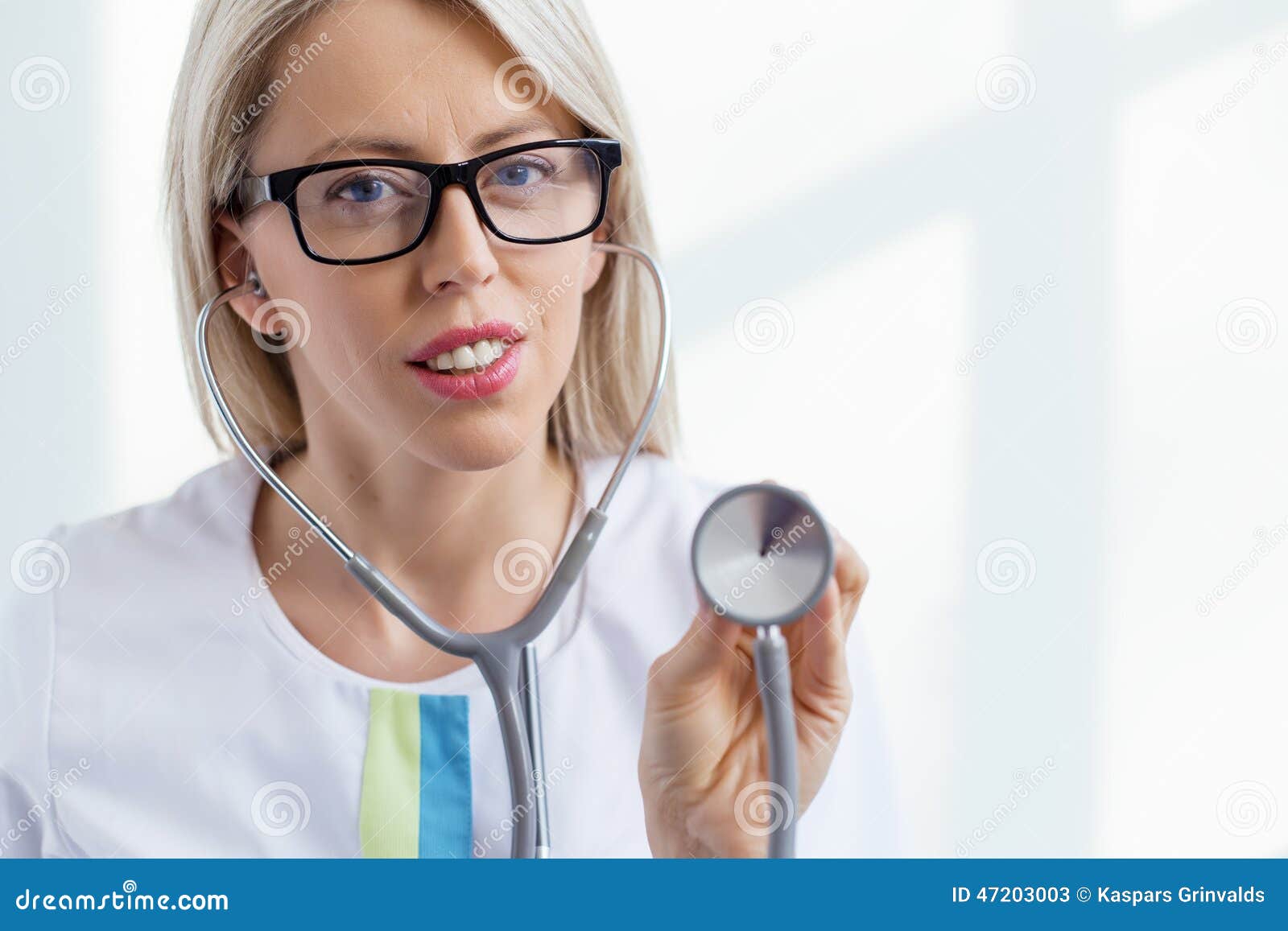 Female Doctor Listening with Stethoscope Stock Image - Image of health ...
