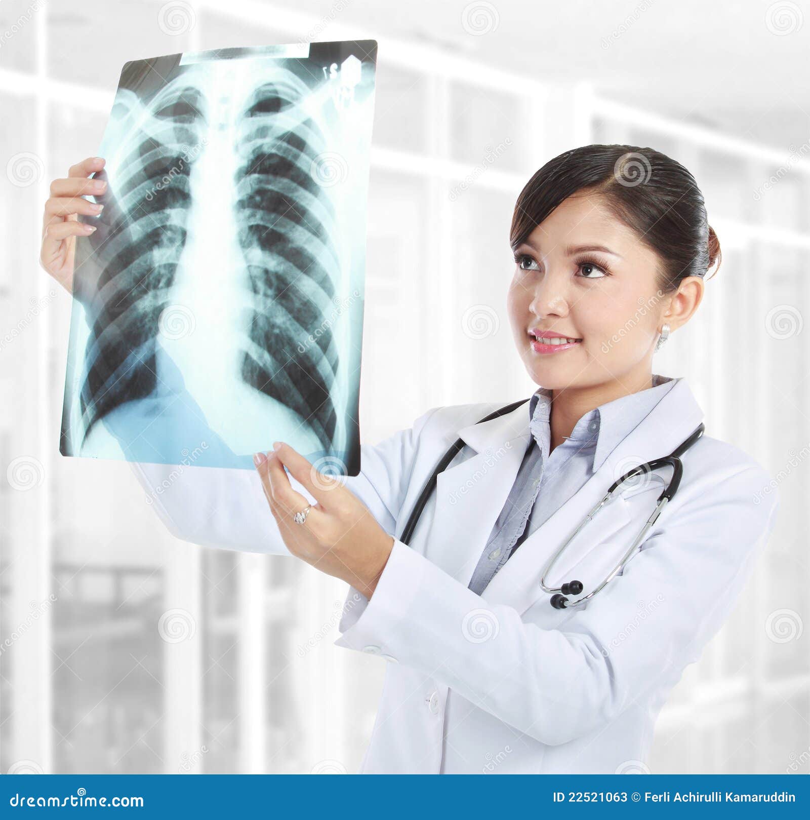 Female Doctor Looking at an X-ray Stock Image - Image of portrait, care ...