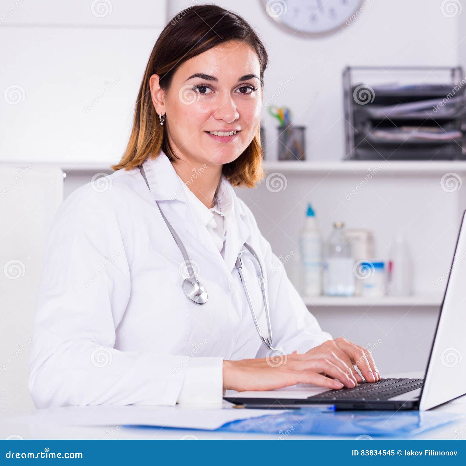 Female Doctor Offering Help Stock Image - Image of caucasian, desk ...