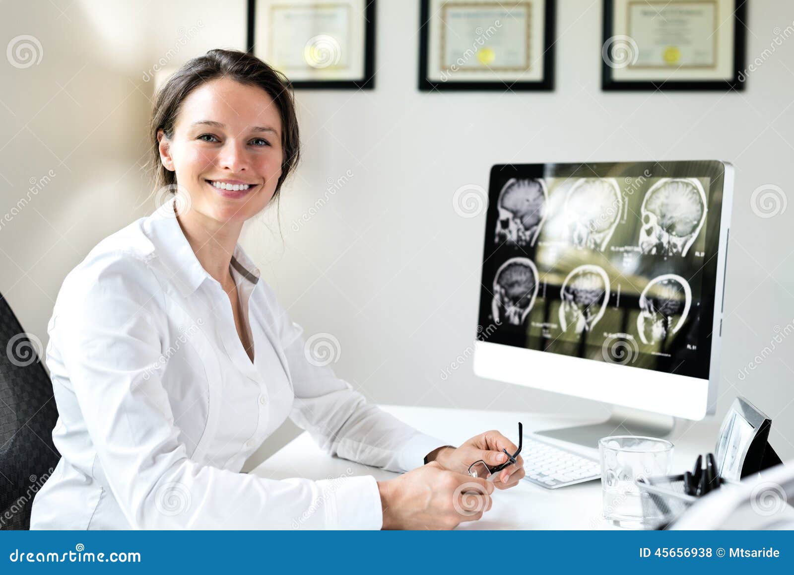 Female Doctor in Office stock photo. Image of camera - 45656938