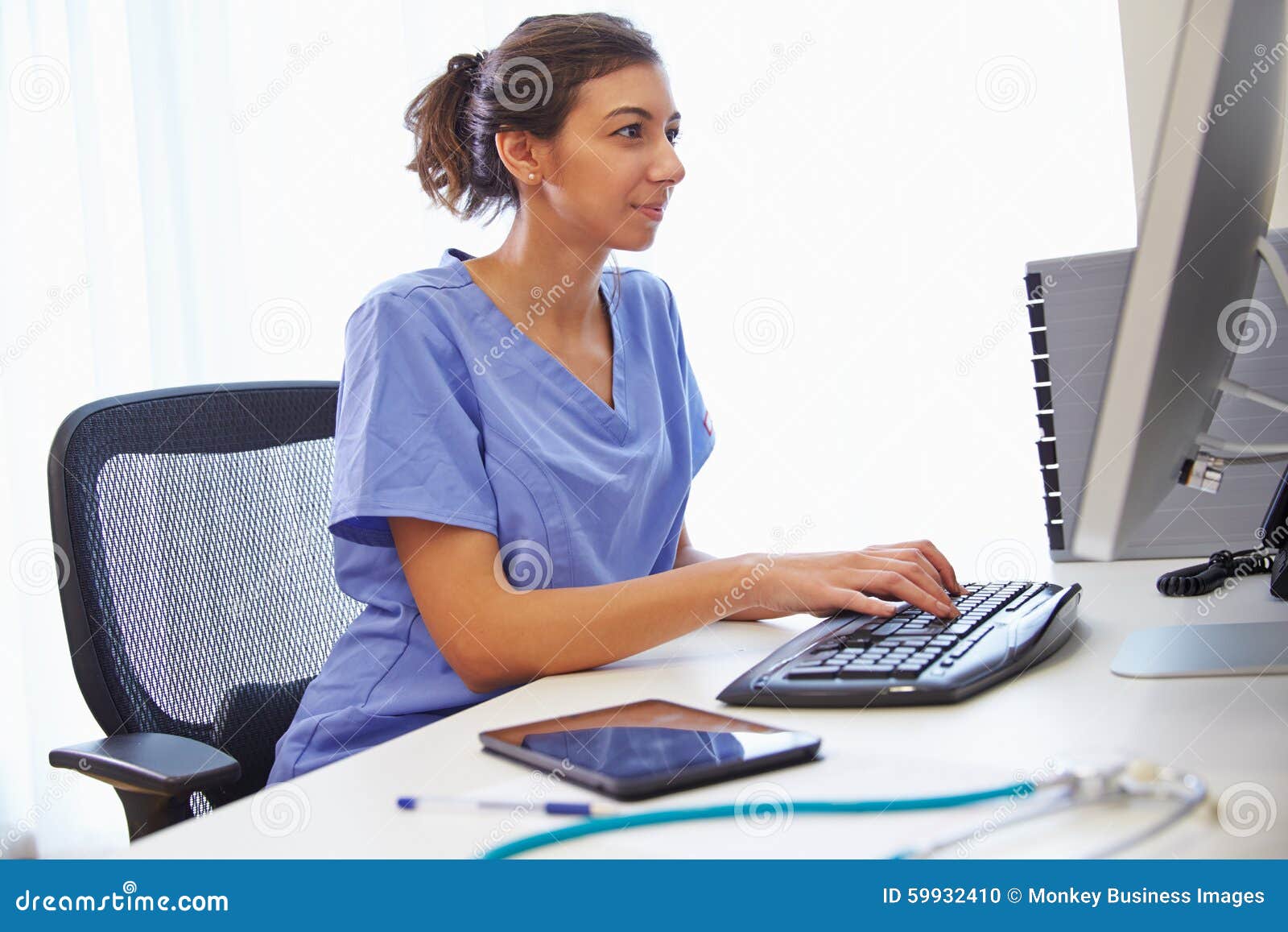Female Doctor in Office Working at Computer Stock Photo - Image of ...