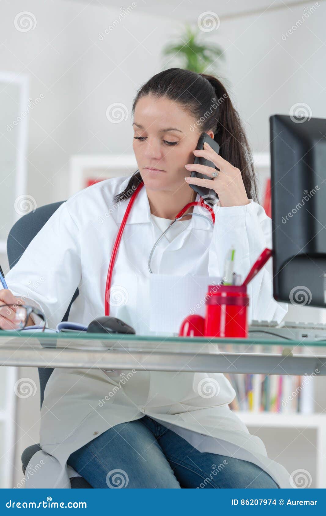 Female doctor on phone stock photo. Image of talking - 86207974