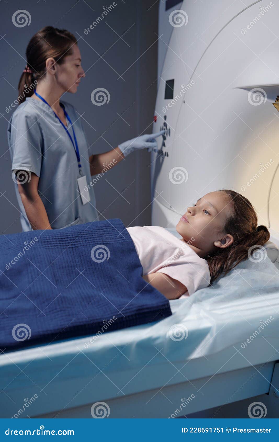 Female Doctor Pushing Button on Control Panel during Mri Scan ...