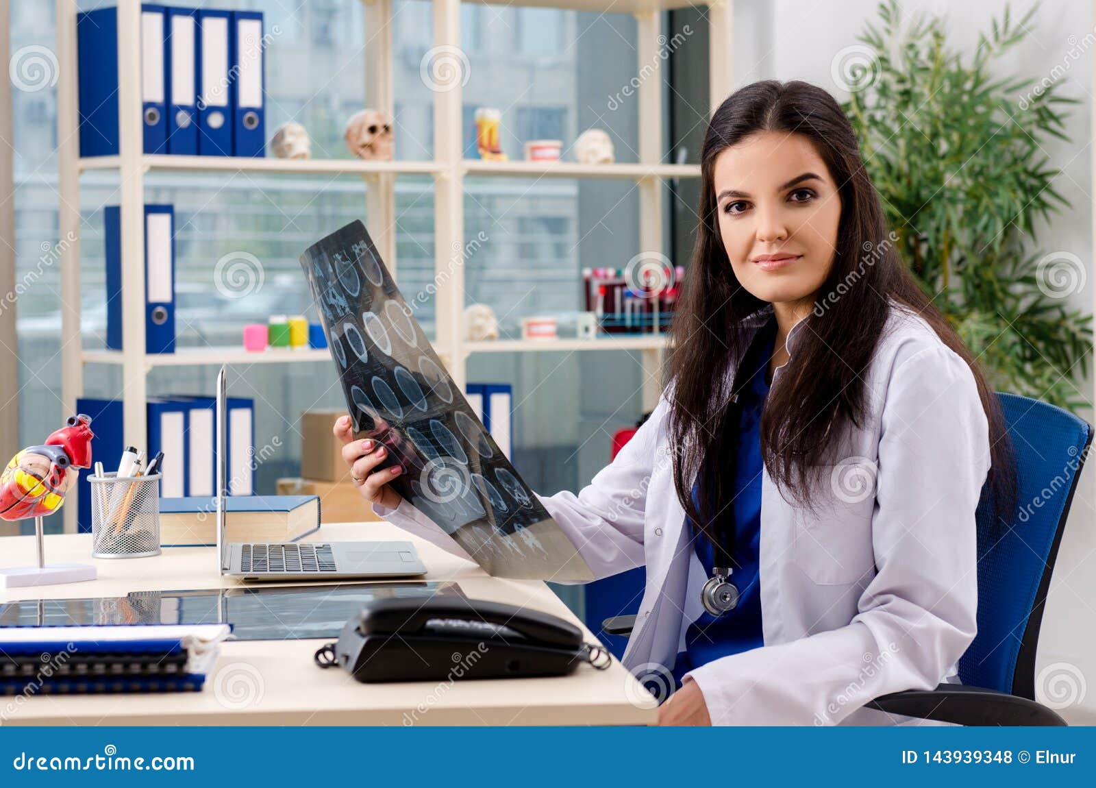 The Female Doctor Radiologist Working in the Clinic Stock Photo - Image ...
