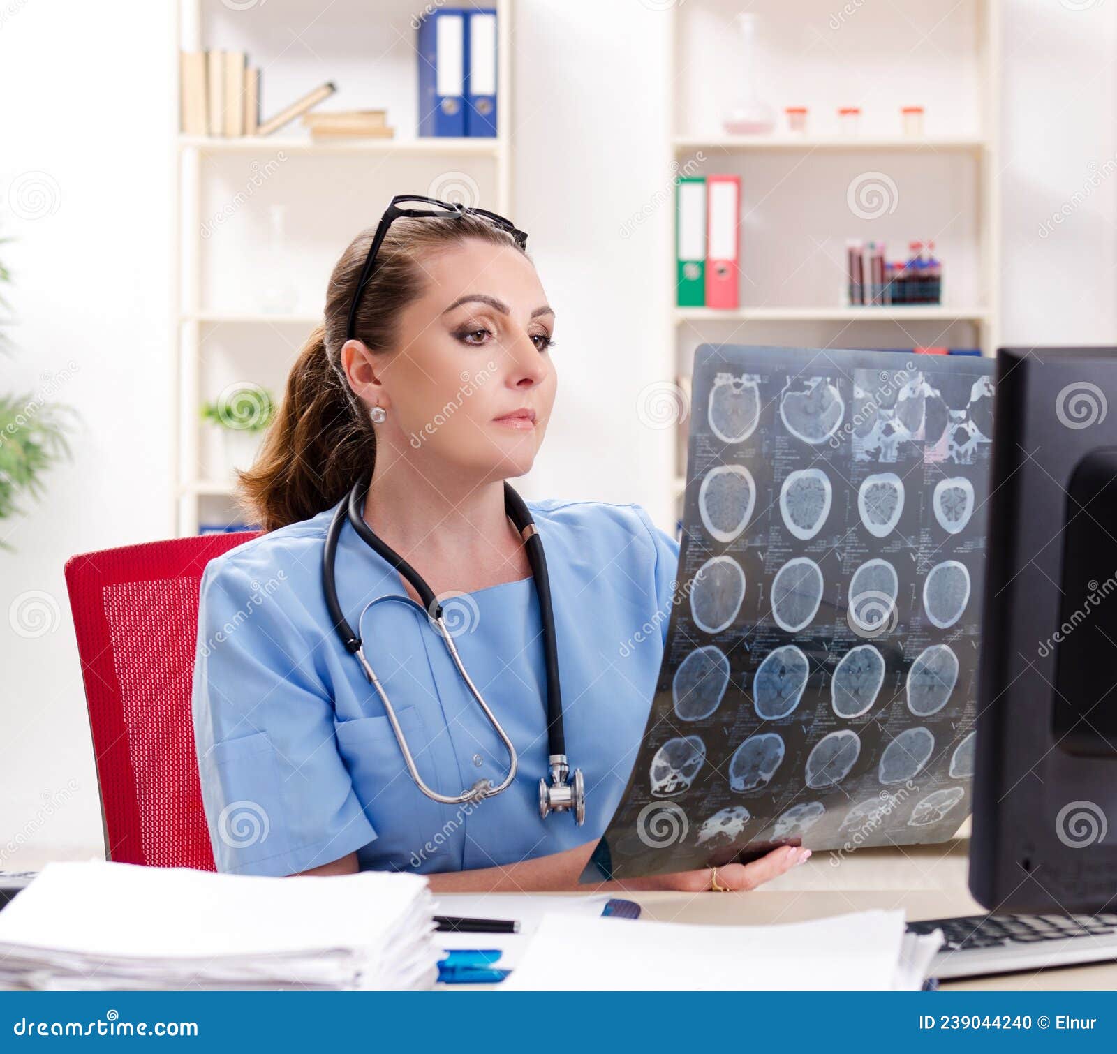 The Female Doctor Radiologist Working in the Clinic Stock Photo - Image ...