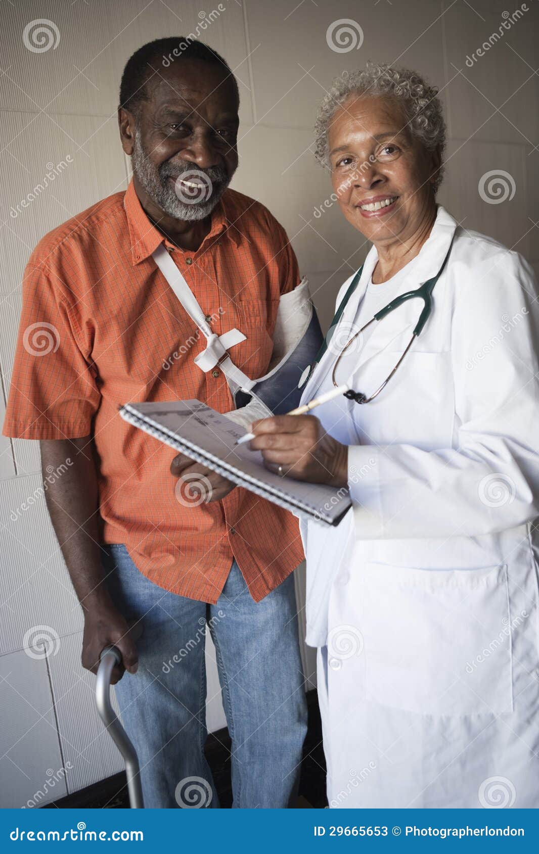 Female Doctor Standing with Disabled Patient Stock Image - Image of ...