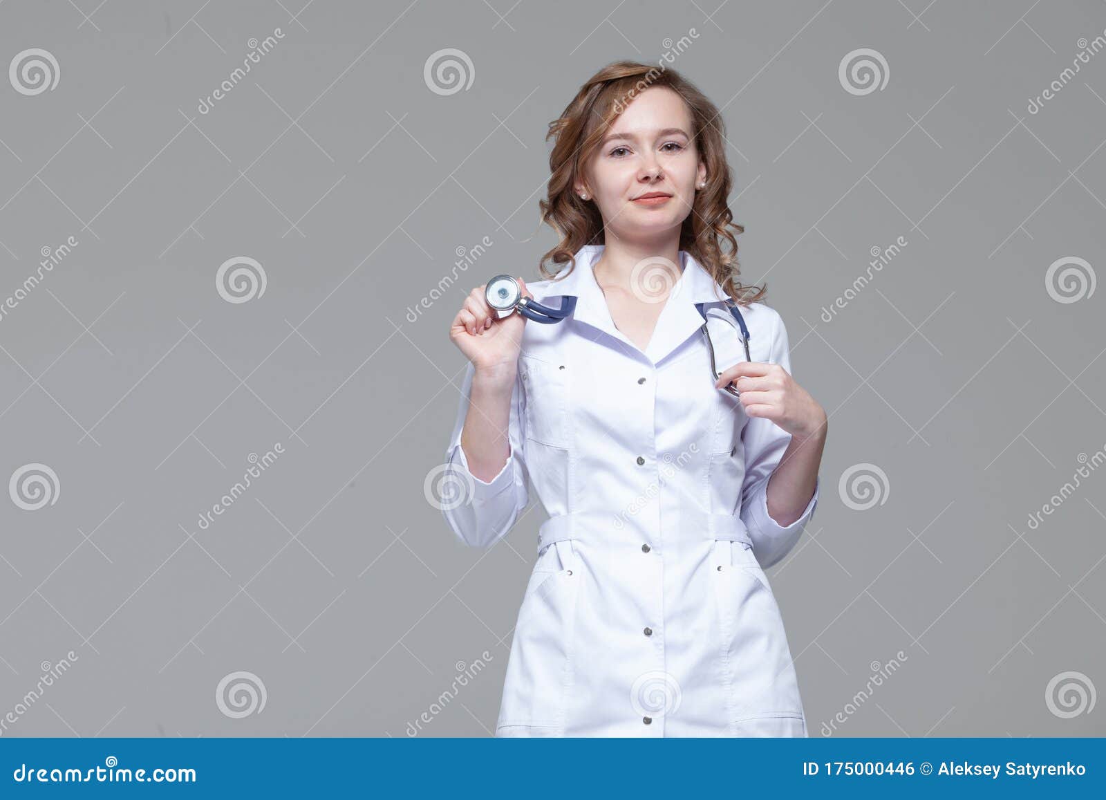 Female Doctor with Stethoscope Standing and Looking at Camera Stock ...