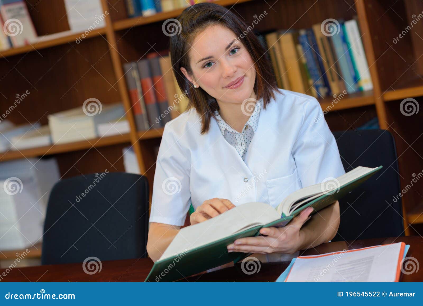 Female Doctor Studying Hard Books Stock Photo - Image of people, doctor ...