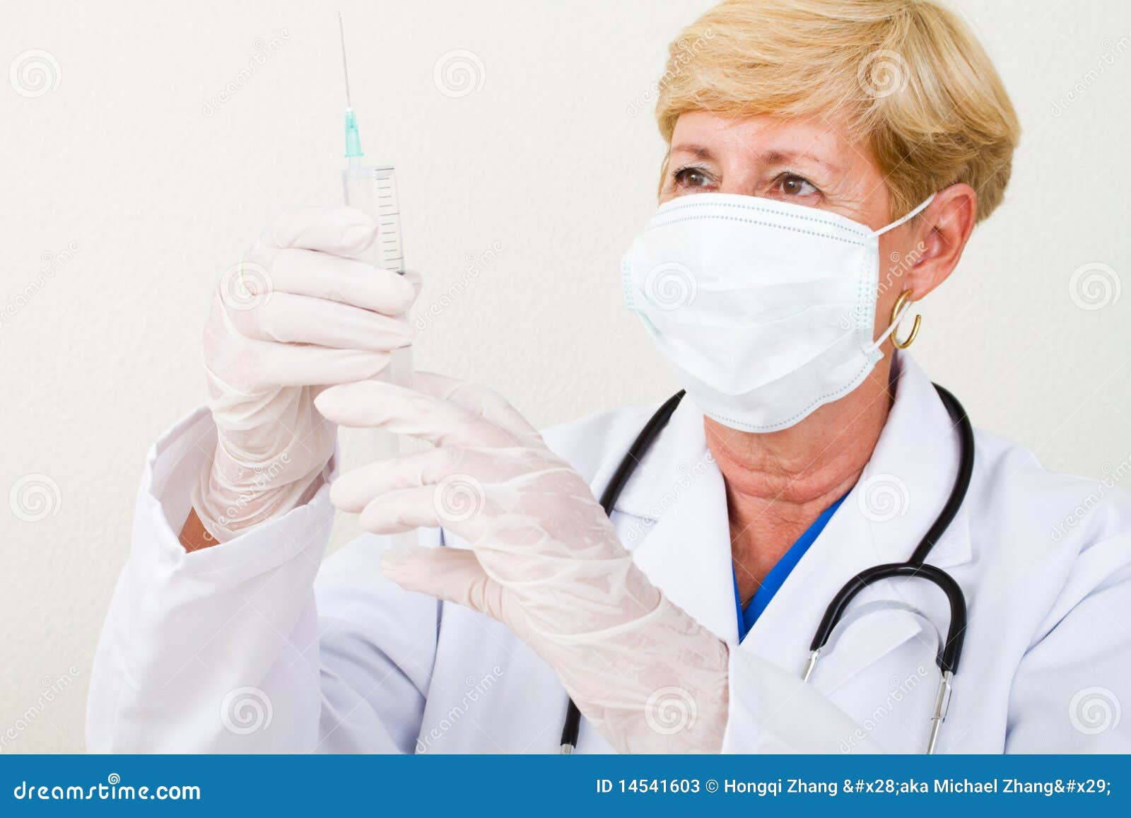 Female doctor with syringe stock image. Image of people - 14541603