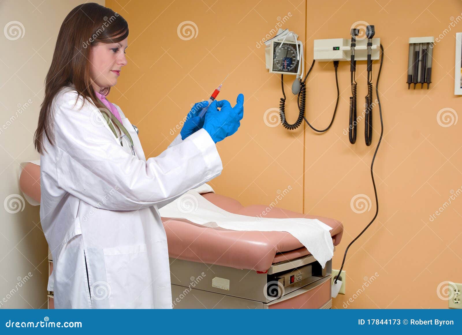 Female Doctor with Syringe stock image. Image of drug - 17844173