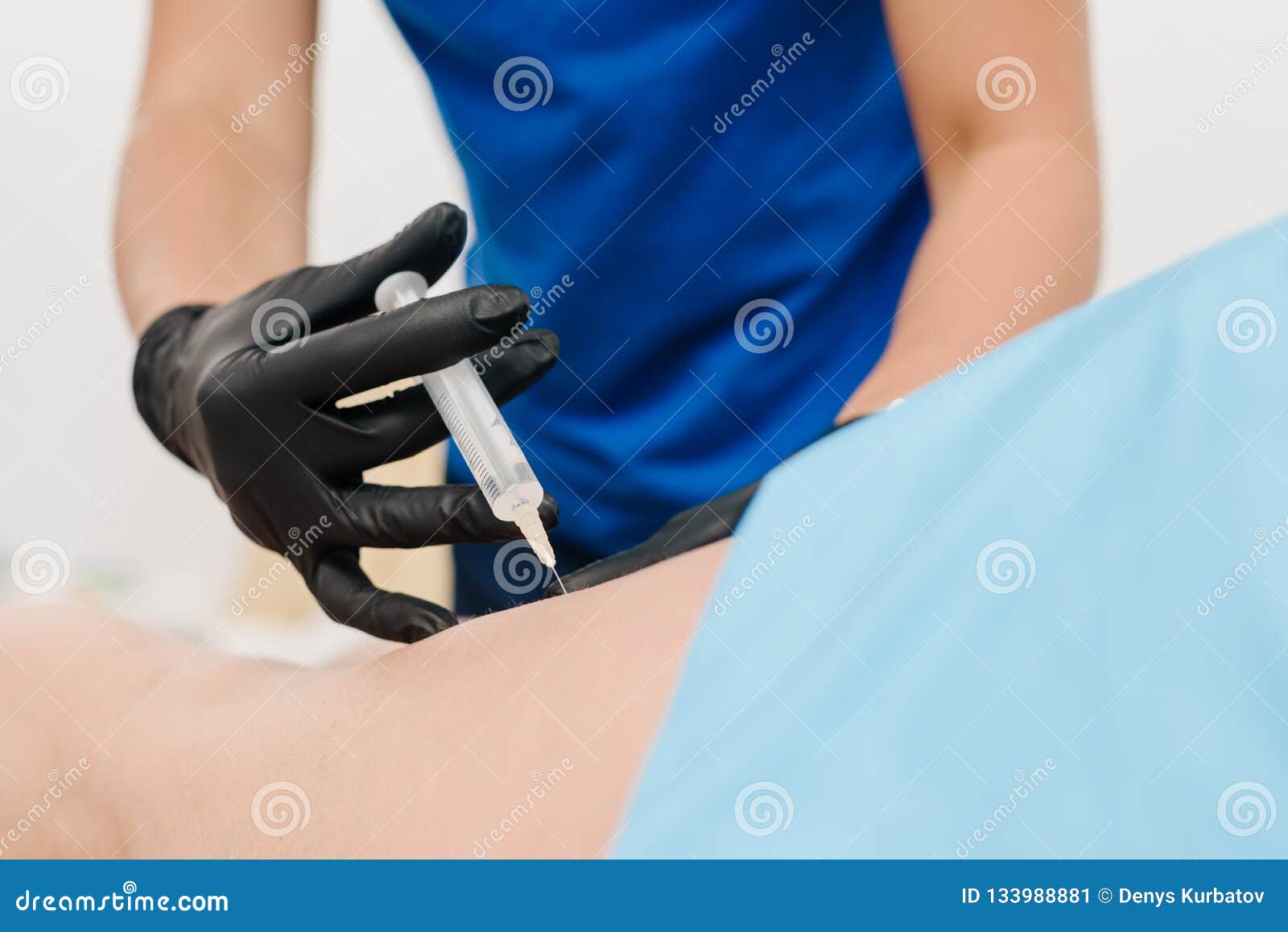 Syringe injection in back stock image. Image of body - 133988881