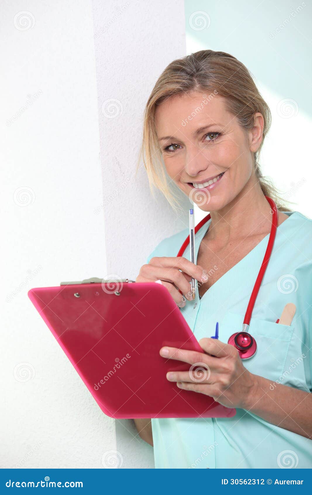 Female doctor taking notes stock photo. Image of fair - 30562312