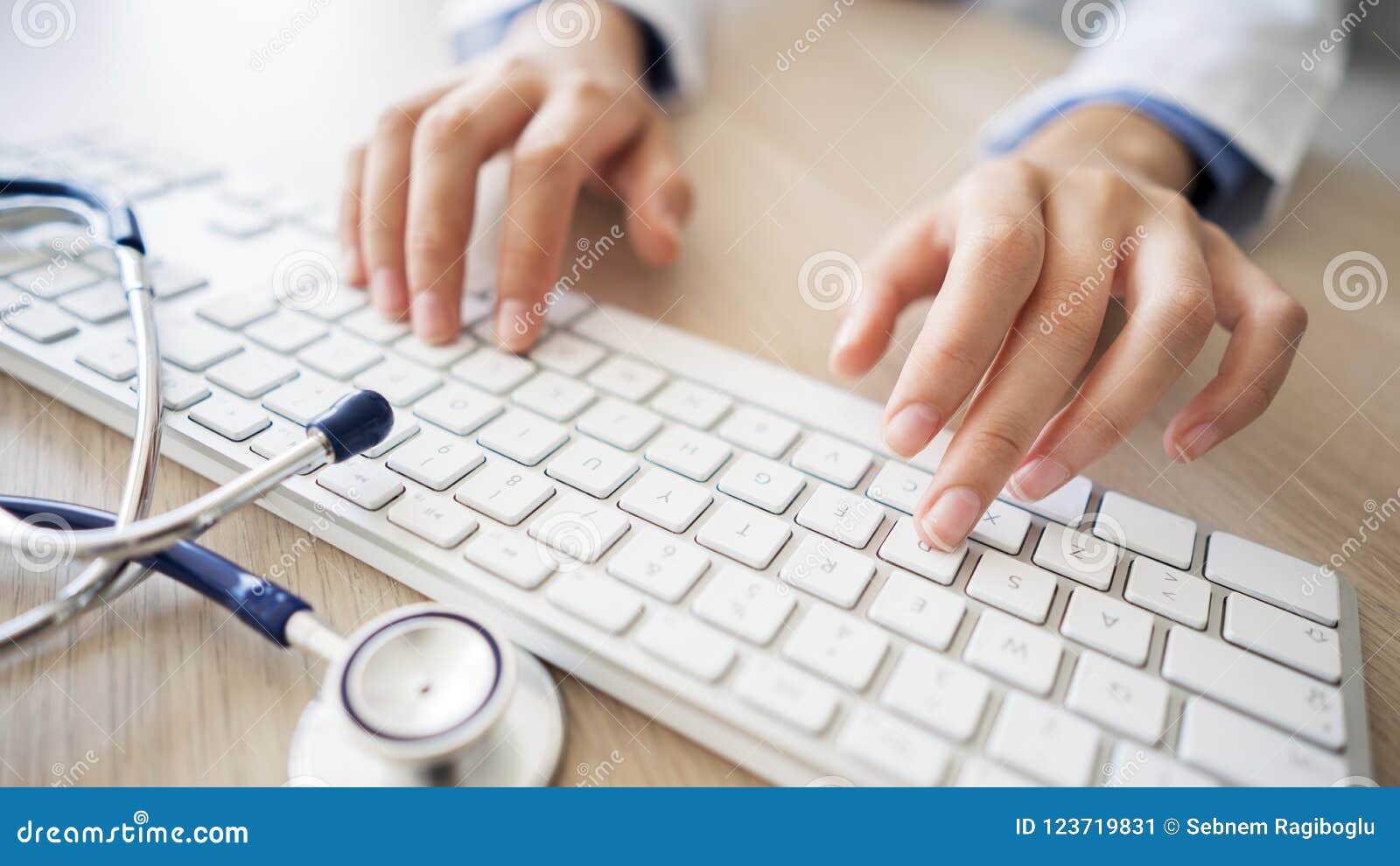 Female Doctor Typing on Computer Stock Image - Image of laptop ...