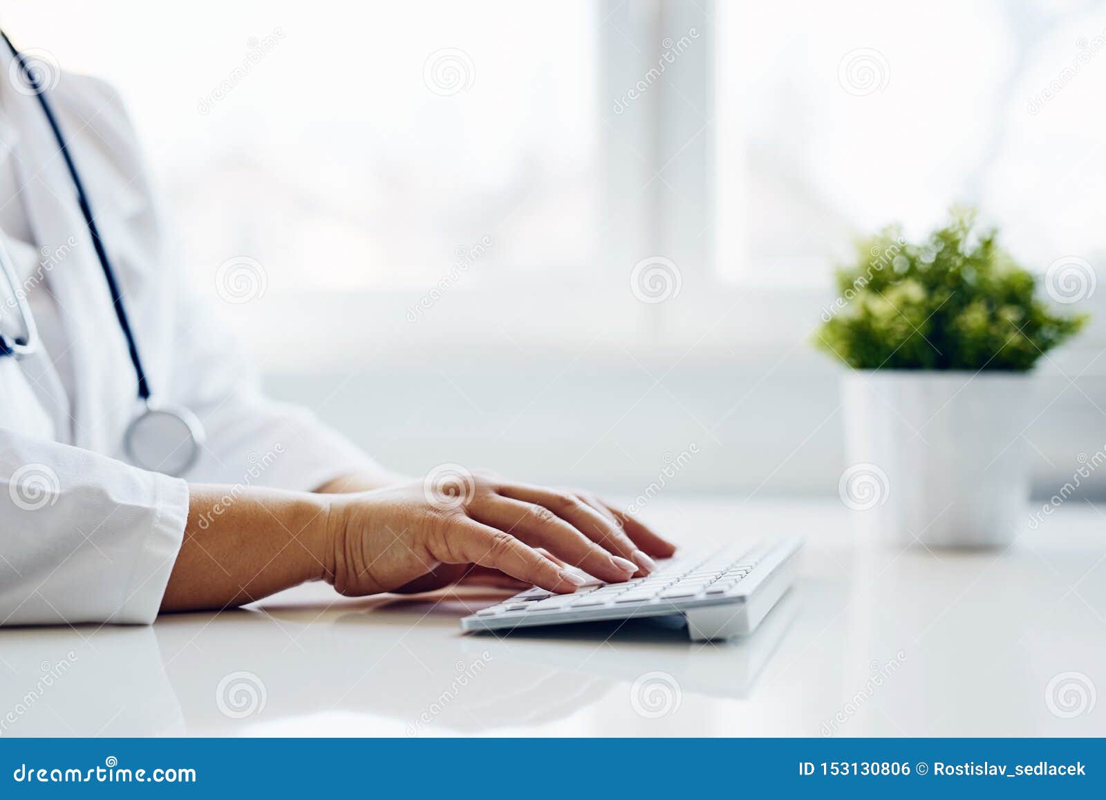 Female Doctor Typing on Keyboard Stock Photo - Image of businesswoman ...