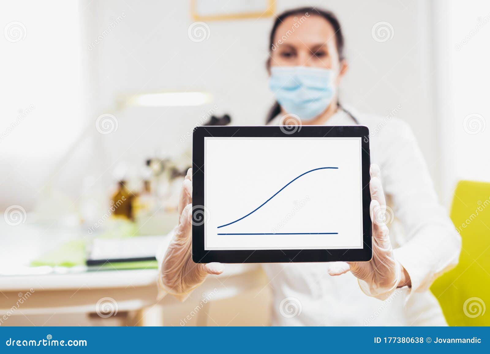 Doctor Uses a Digital Tablet and Displays Disease Statistics on the ... Doctor Uses a Digital Tablet and Displays Disease Statistics on the ...