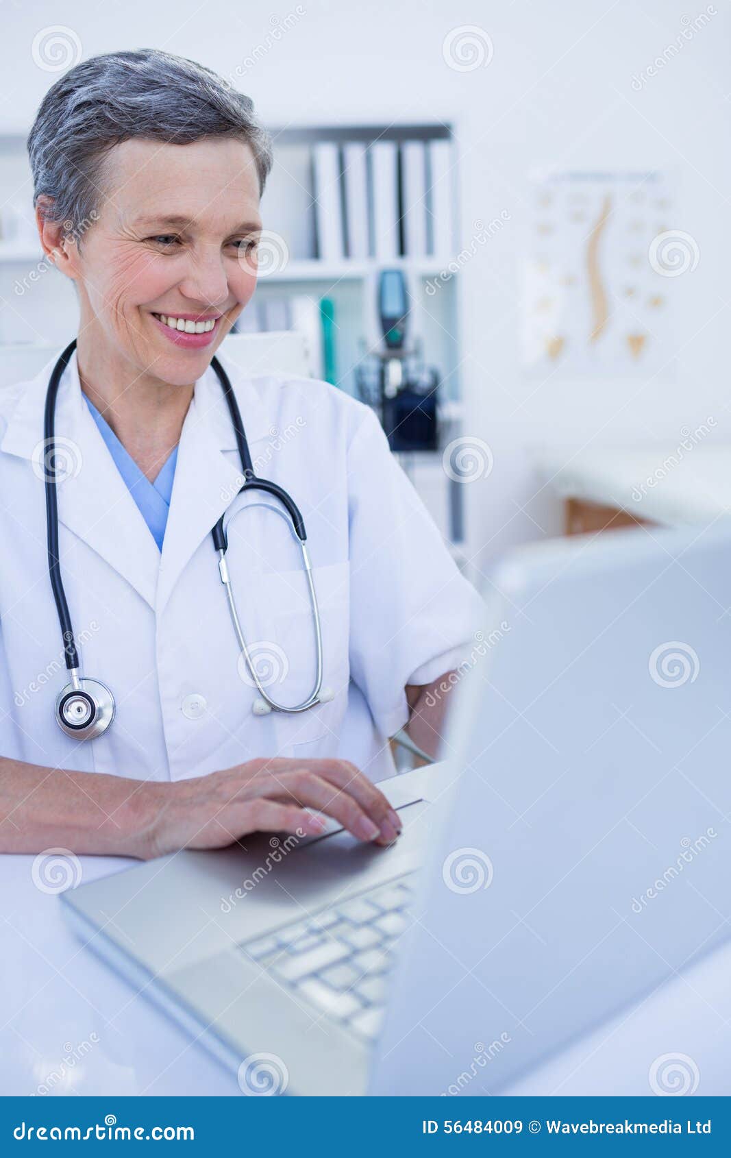 Female Doctor Using Her Laptop Computer Stock Image - Image of ...