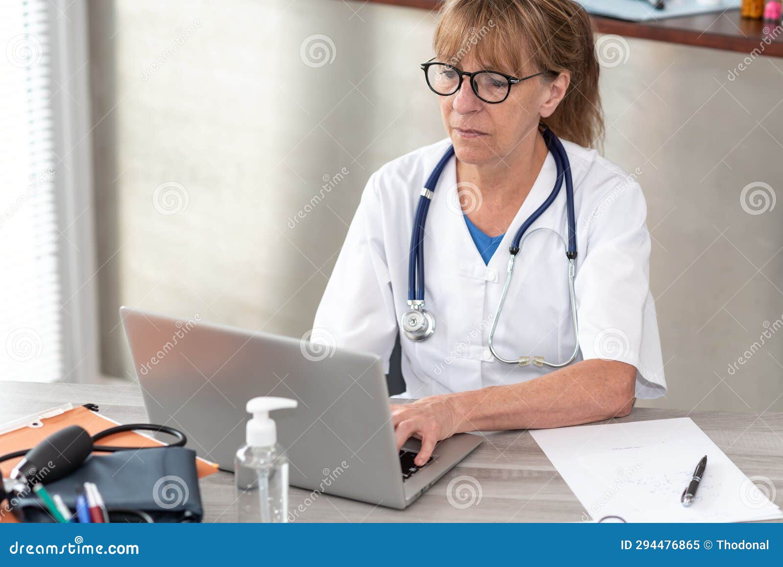 Female doctor using laptop stock image. Image of specialist - 294476865
