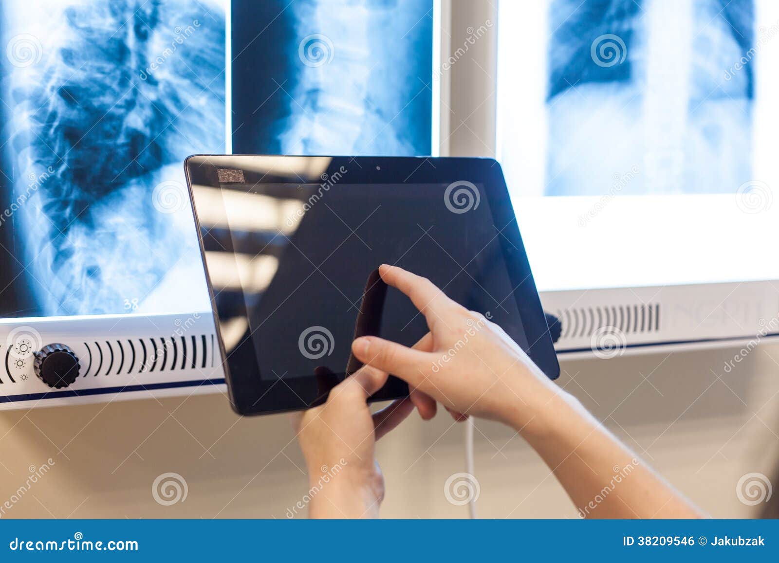 Female Doctor Using Tablet in a Hospital. Stock Photo - Image of female ...