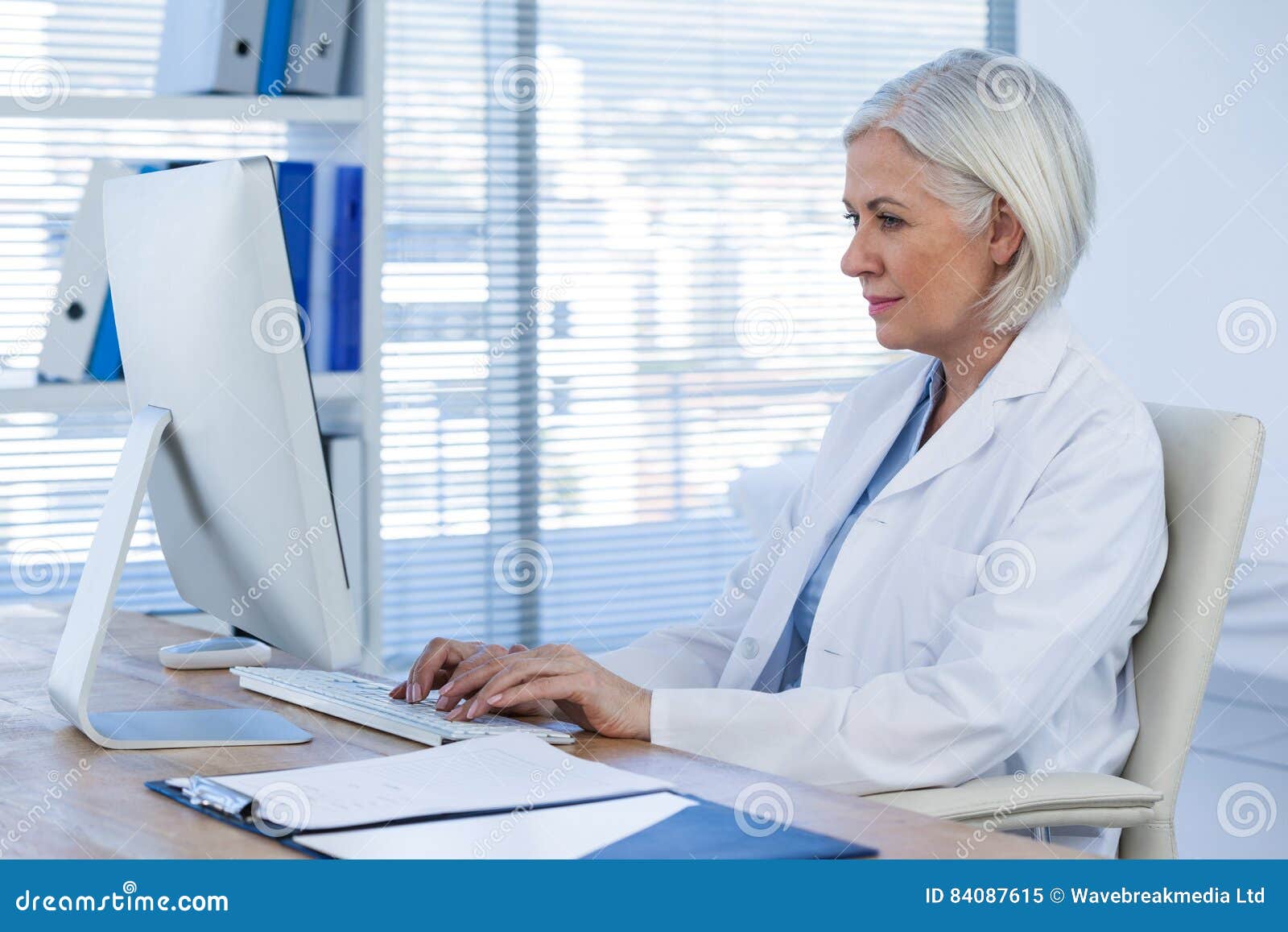 Female Doctor Working on Computer Stock Image - Image of caucasian ...