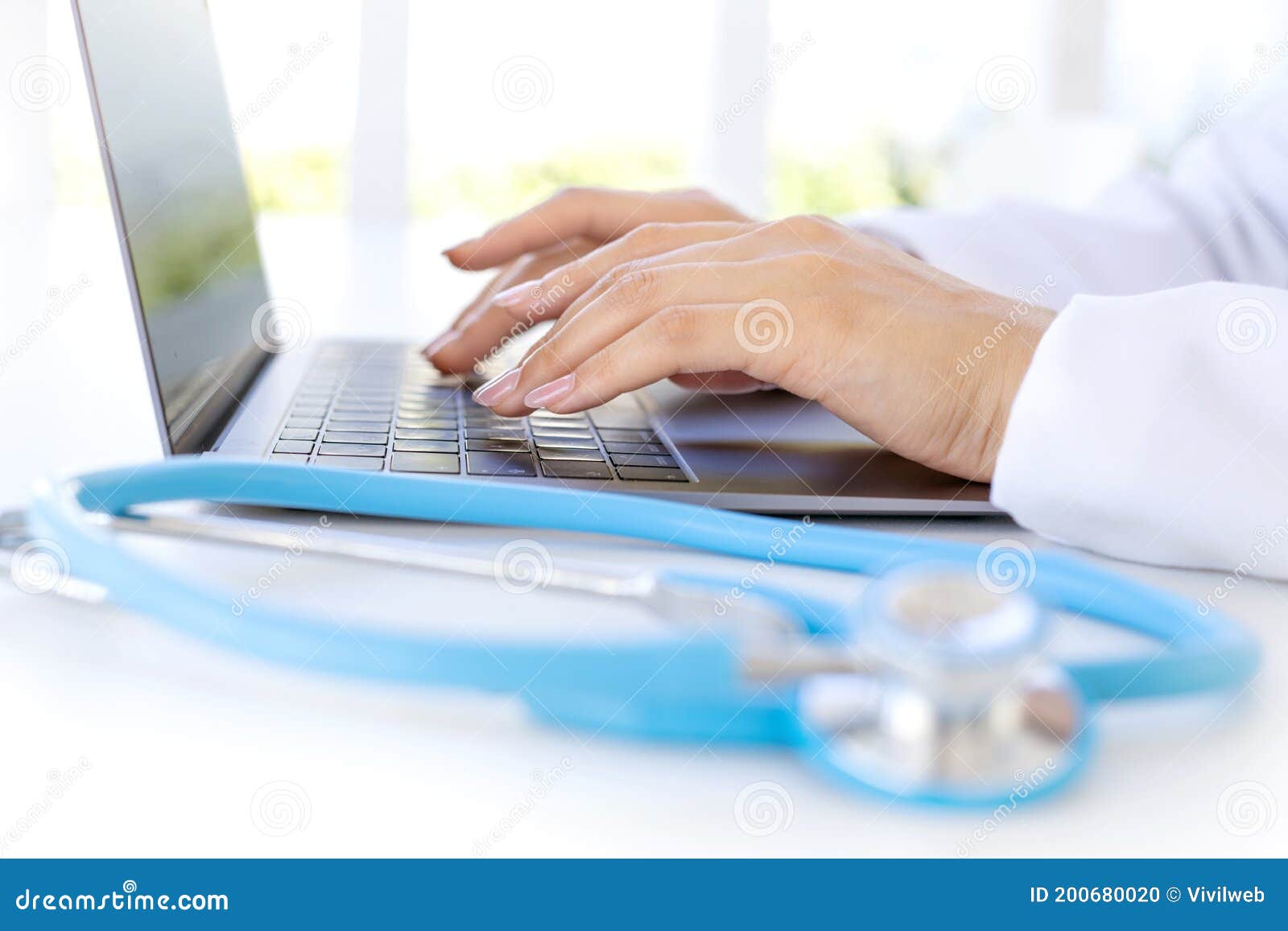 Female Doctor while Working on Computer Stock Photo - Image of online ...