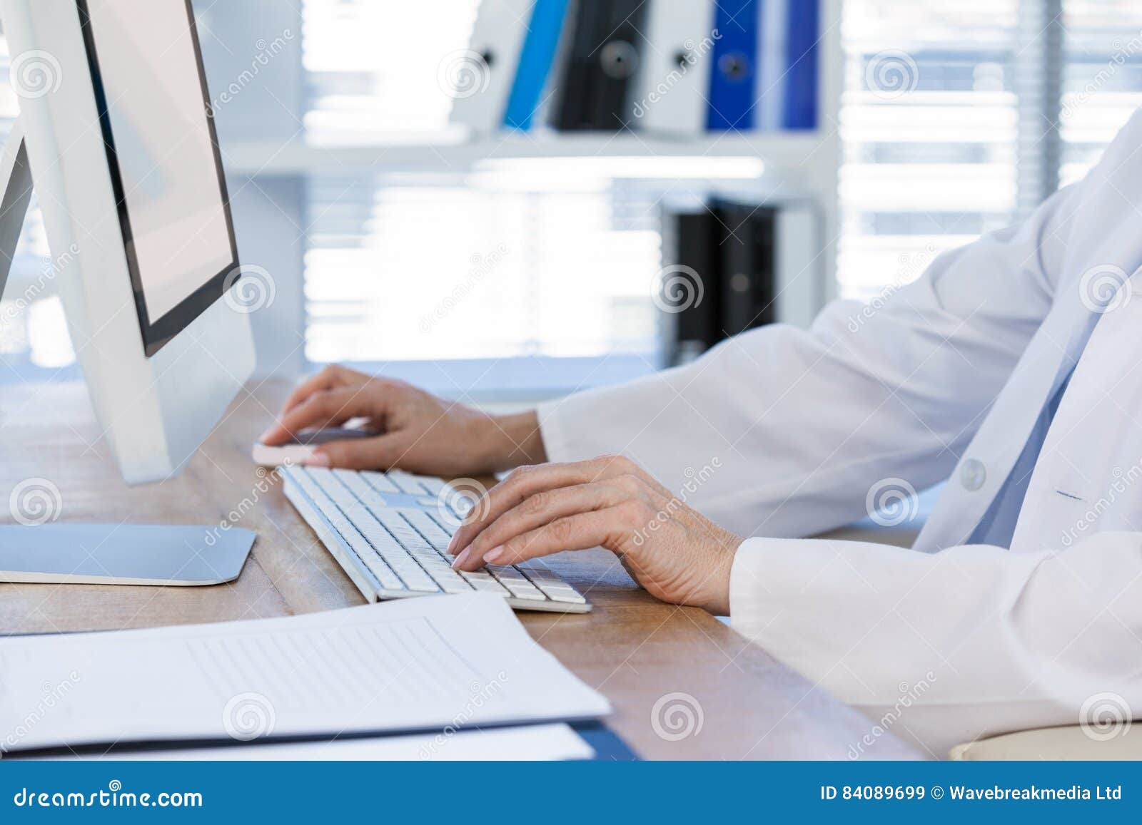 Female Doctor Working on Computer Stock Image - Image of electronic ...