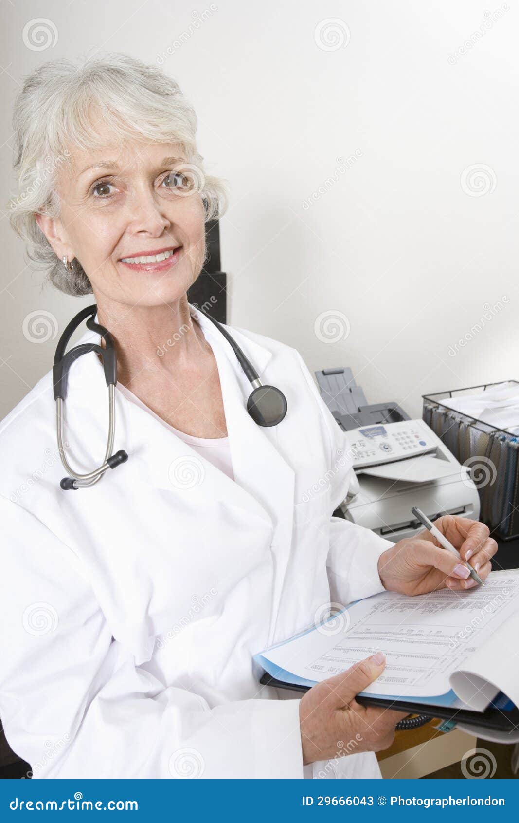 Female Doctor Writing Notes on Clipboard Stock Image - Image of ...