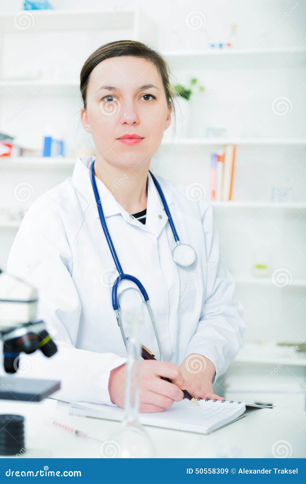 Female Doctor Is Writing Prescription At The Stock Image Image Of