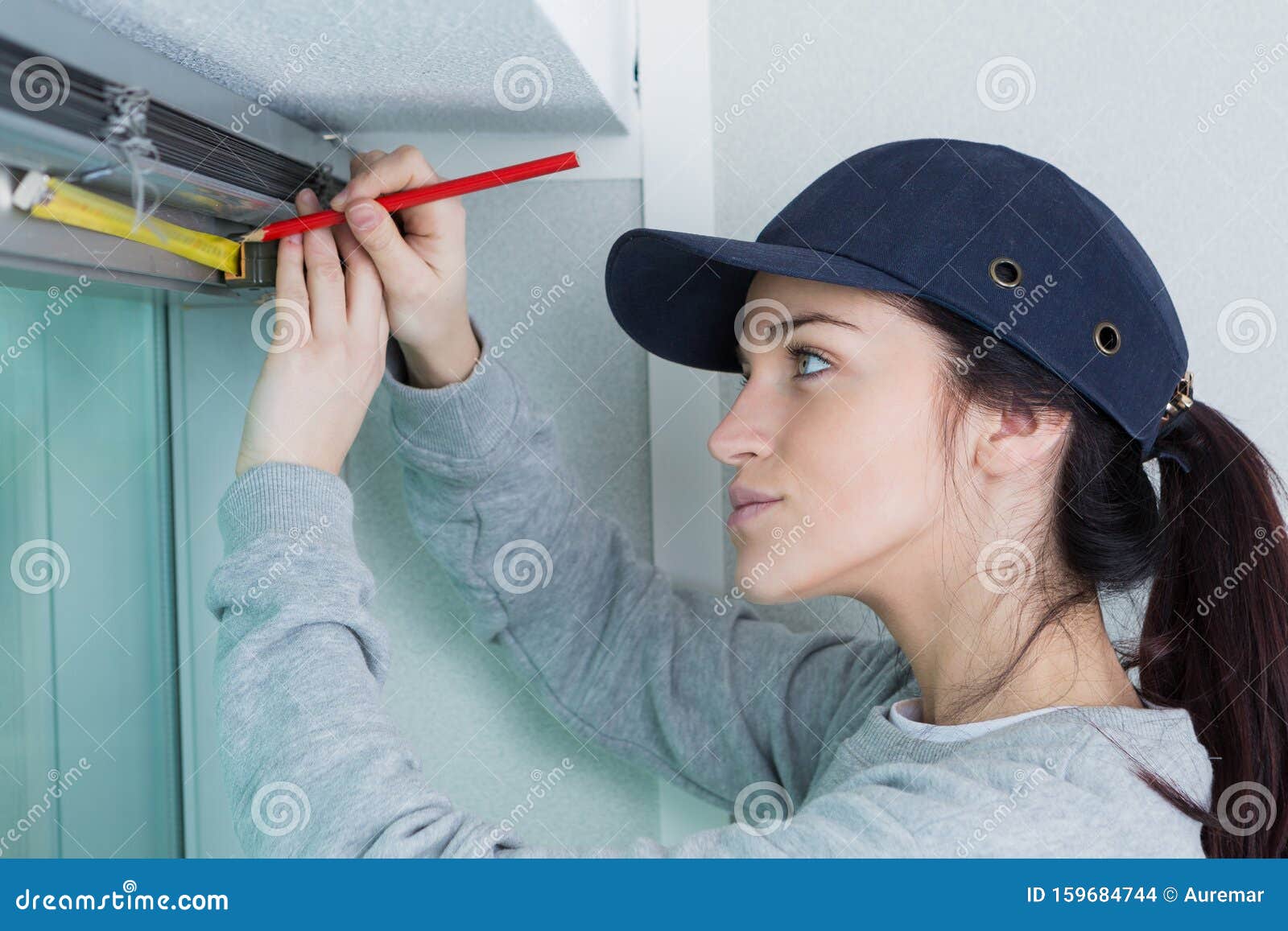 Female doing diy at home stock photo. Image of frame - 159684744