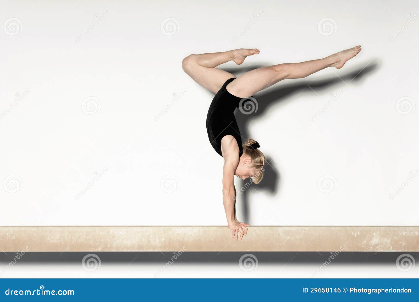 Female Doing Handstand on Balance Beam Stock Photo - Image of aerobics ...