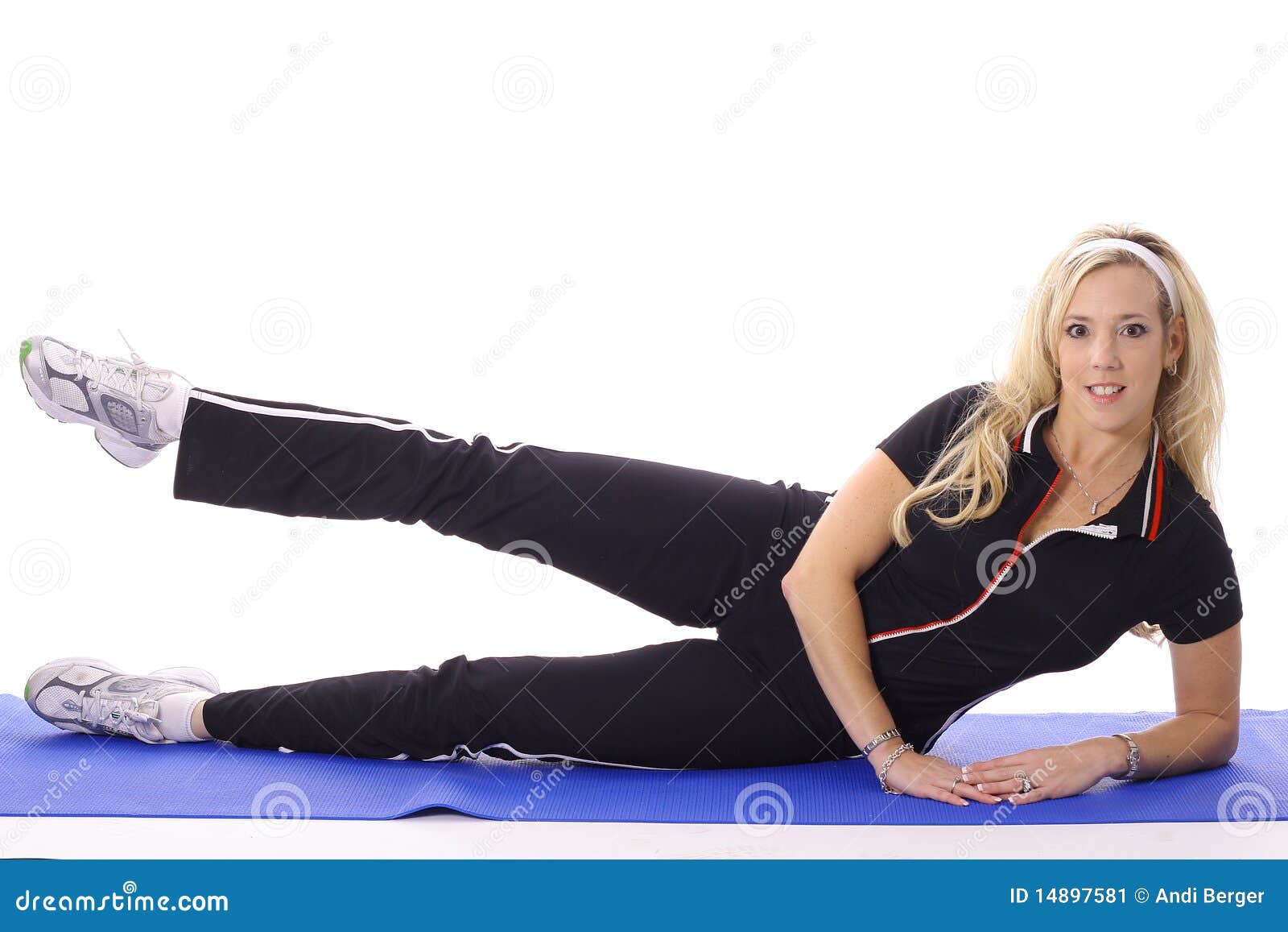 Female doing leg lifts stock image. Image of body, lift - 14897581