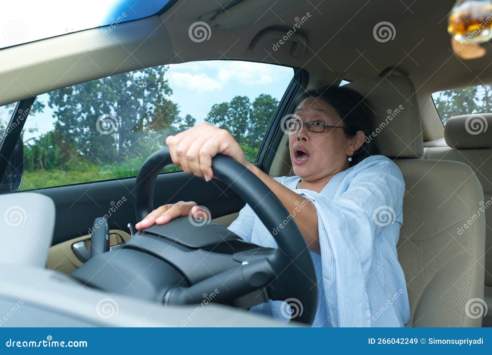 A Female Driver Looking Panic and Quickly Pressed the Horn in the ...