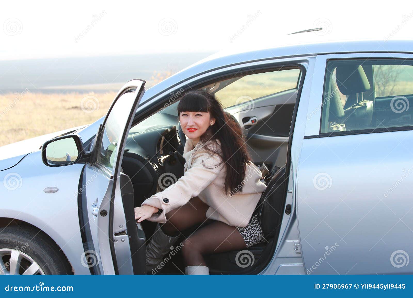 A Female Driver Opens a Car Door Stock Image - Image of coat, smiling ...