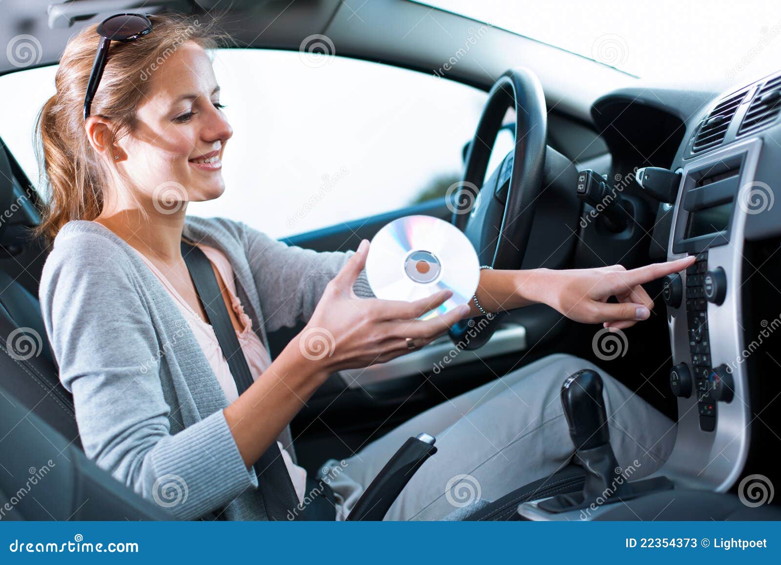 Female Driver Playing Music in the Car Stock Image - Image of road ...