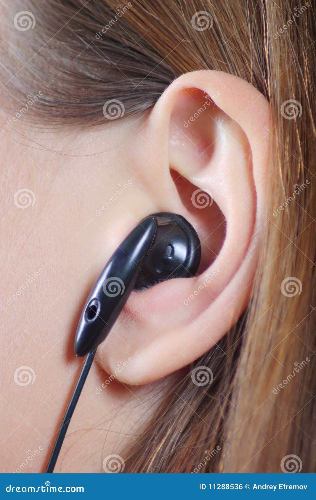 Female Ear with an Ear-phone Stock Photo - Image of hair, black: 11288536