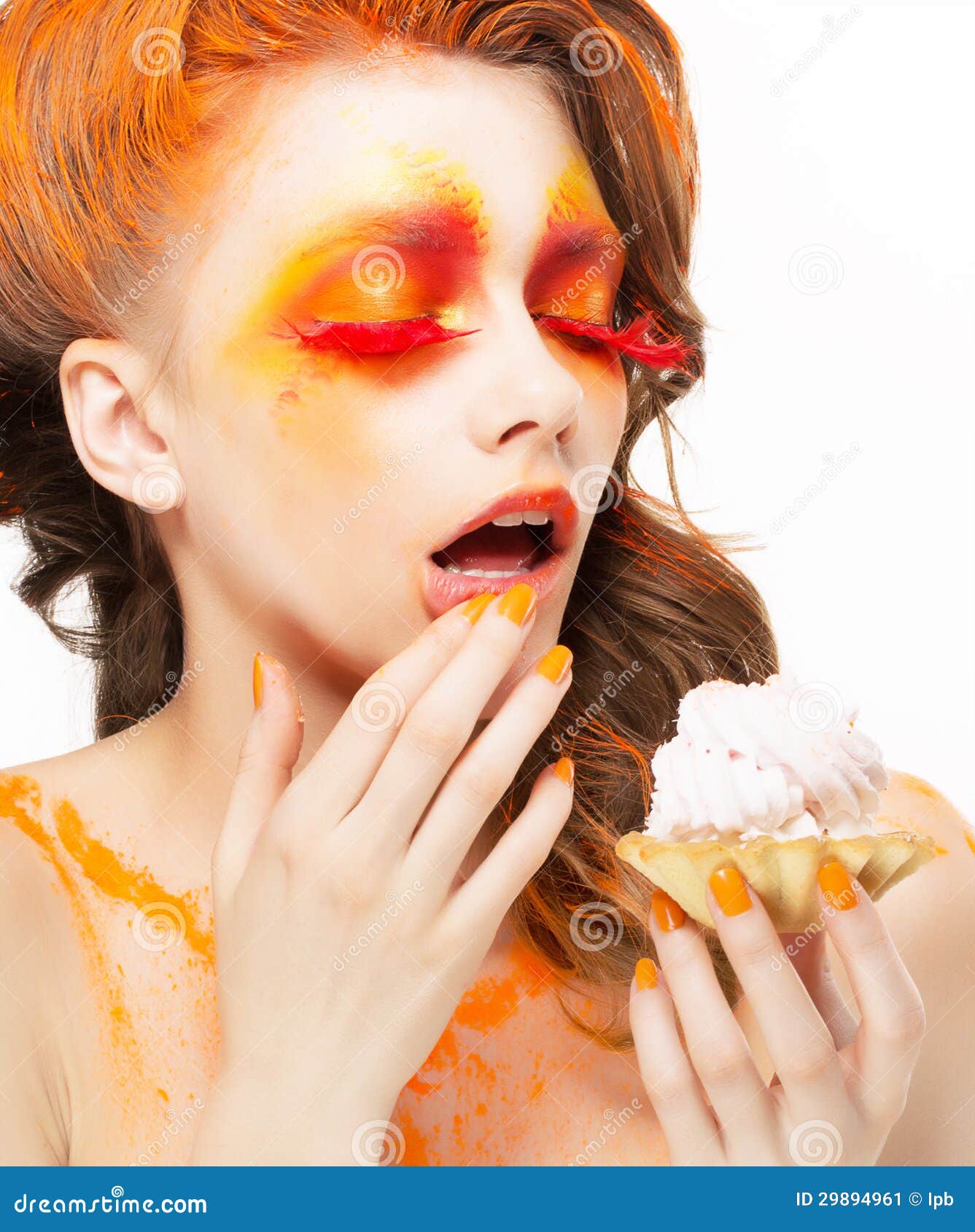 Gilding. Tempting Woman Eating a Pie with Cream. Bright Red-Golden ...