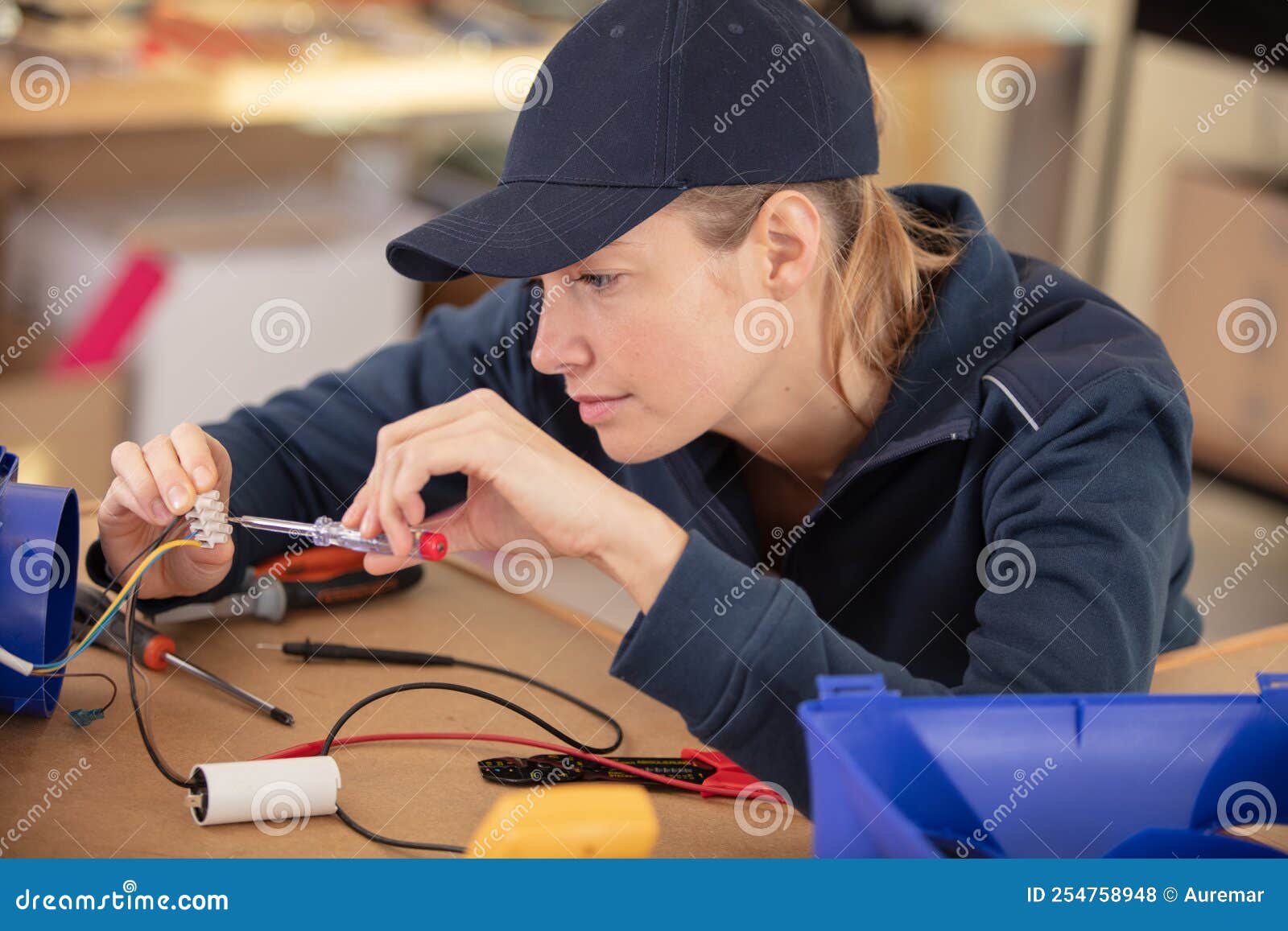 Female Electrician Checking Fusebox Stock Photo - Image of industrial ...
